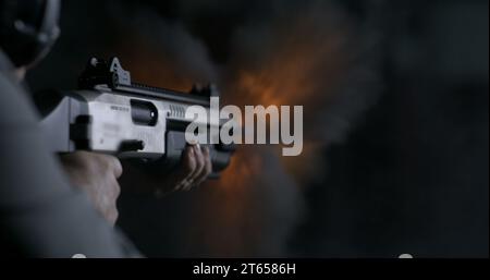 High-Speed 800fps Slow-Motion Speed-Ramp of Man Firing Shotgun ...