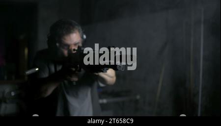 High-Speed 800fps Slow-Motion Speed-Ramp of Man Firing Shotgun ...