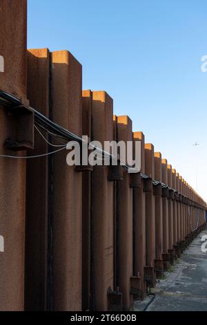 Security wall shows aging and dilapidation; electric and video ...