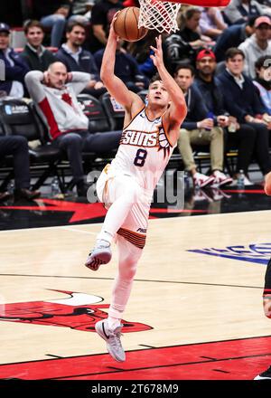 Phoenix Suns guard Grayson Allen (8) dribbles during the first half of ...
