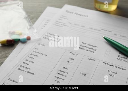 Drug test result form, pills and pen on light table, flat lay Stock ...