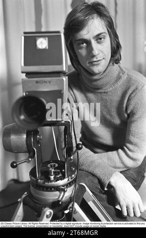Swedish film director Lasse Hallstrom with his son John, age 2 and ...