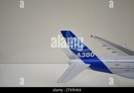 Aircraft model A380 miniature with white and blue paint. White ...