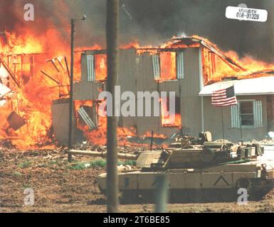 Abrams tank next to burning Branch Davidian compound Stock Photo - Alamy
