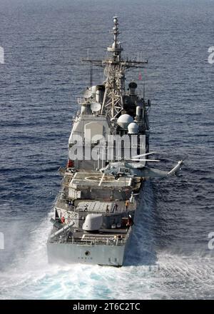 USS Anzio (CG 68) and USS Dwight D. Eisenhower (CVN 69) conduct a ...