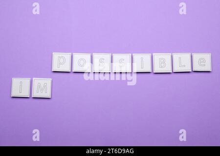 Motivation concept. Changing word from Impossible into Possible by ...