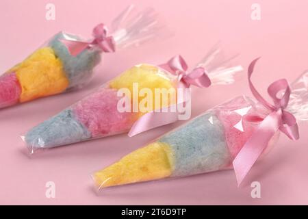 Packaged sweet cotton candies on color background, flat lay Stock Photo ...