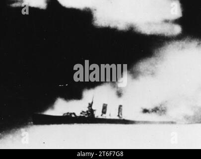USS Quincy (CA-39) under fire during the Battle of Savo Island on 9 ...