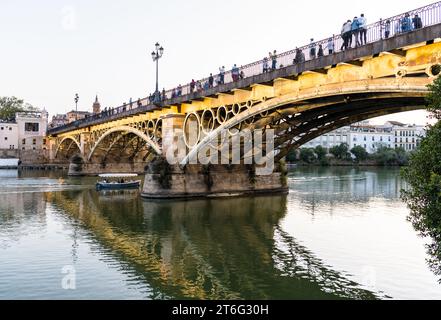 Triana Bridge, the oldest bridge of Seville Stock Photo - Alamy