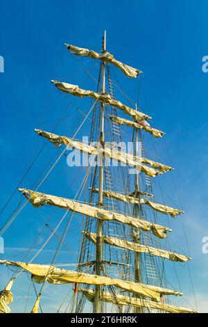 The main mast of the ship with a blue sky in the background Stock Photo ...