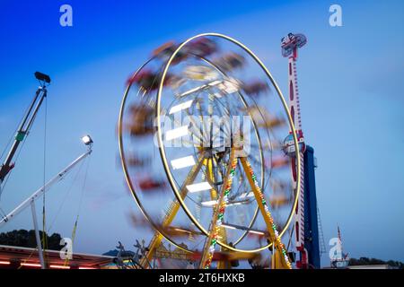 Photographic documentation of a Ferris wheel inside an amusement park ...