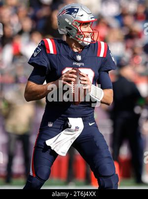 New England Patriots quarterback Mac Jones (50) warms up during an NFL ...