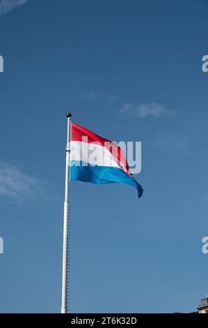 Views of big flag of Luxembourg country and blue sky in Luxembourg or ...