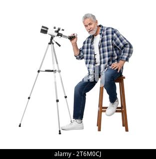 Senior astronomer with telescope on white background Stock Photo - Alamy