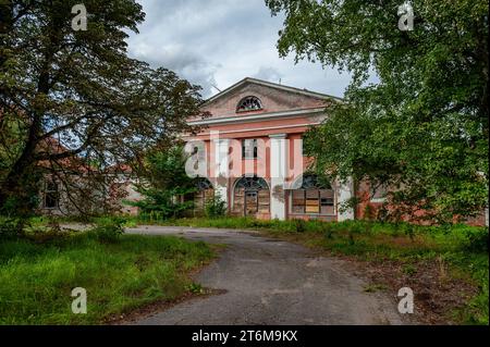 Abandoned Manor House in Kurzeme, Latvia. Main building and entrance of ...