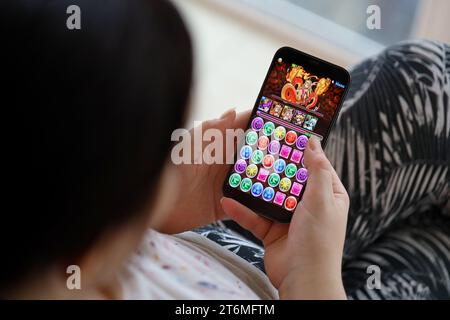Puzzle and dragons mobile iOS game on iPhone 15 smartphone screen in ...