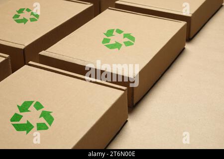 Cardboard boxes with recycle sign stamps on white background Stock ...