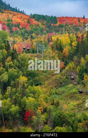 The gondola lift up Moose Mountain with fall foliage color at the ...