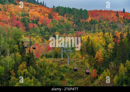 The gondola lift up Moose Mountain with fall foliage color at the ...