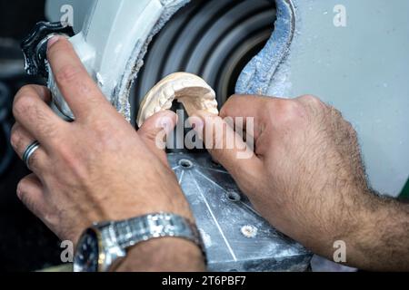 Grinding and sawing the teeth crowns holder prototype to be used in ...