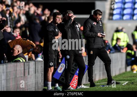 Mark Bonner (Manager Cambridge United) shades his eyes during the Sky ...