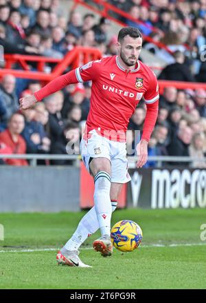 Anthony Forde 14# of Wrexham Association Football Club bring the ball ...