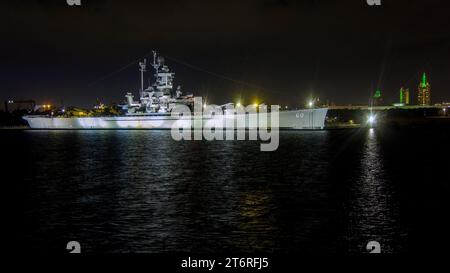 Aerial view of the USS Alabama battleship and the Mobile skyline at ...