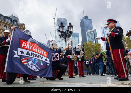 Members of the Indianapolis Colts hold a football before an NFL ...