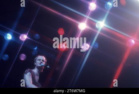 Singer, songwriter and performer Peter Allen on stage in Central Park ...