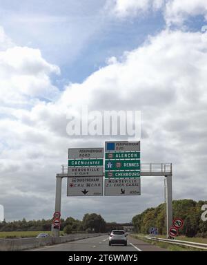 large road sign with French locations to go to the city of Le Havre or ...