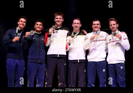 USA’s Ruben Padilla and Aliaksei Shostak pose with their Silver medals ...