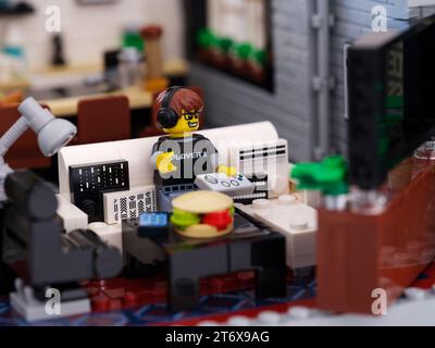 Lego Video Game Guy minifigure (player 1) at his table with computer ...