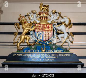 Royal Warrant & Royal coat of arms on premises of wine merchant ...