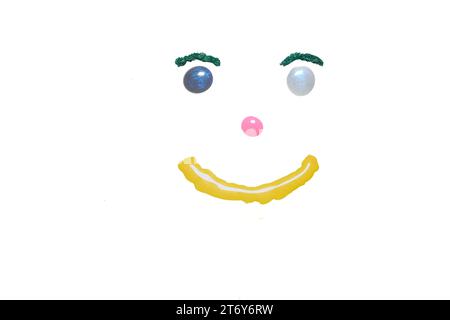 Smiley face vibrantly created using nail polish, relates to happiness ...