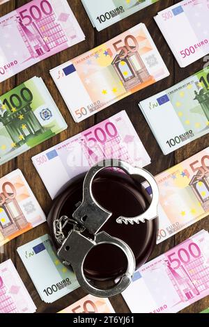 Gavel with stand and handcuffs Stock Photo - Alamy