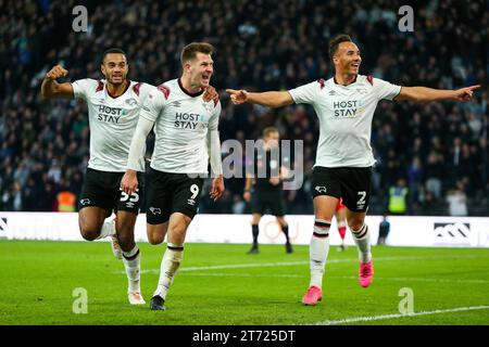 Derby County's Kane Wilson celebrates scoring their side's second goal ...