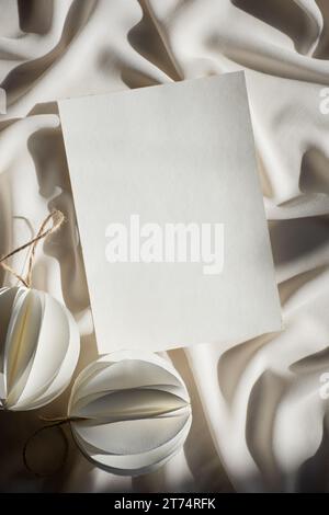 White sheet of paper among the green leaves Stock Photo - Alamy