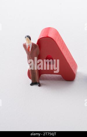 Man figurine and Letters of abc of alphabet on white Stock Photo - Alamy