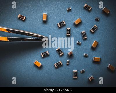 Electronic components, many ceramic capacitors and chip resistors on ...