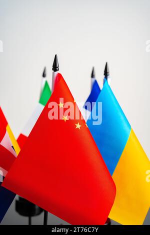 Lots of small national flags on table Stock Photo - Alamy