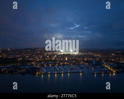 Aerial night view of the illuminated Aalborg stadion (also known as ...