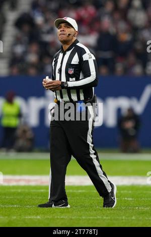 Referee Tra Blake (3) works during an NFL football game between the New ...