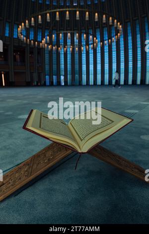 The Holy Quran in a modern mosque. Ramadan or islamic background ...