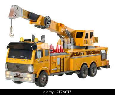 Mobile truck-mounted crane lifting heavy concrete building materials on ...