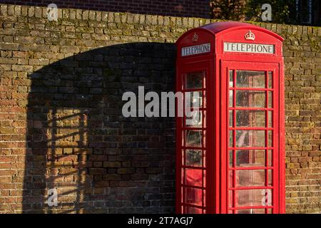 Traditional red phonebooth in late afternoon sun. London, UK Stock ...