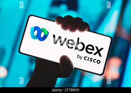 In this photo illustration, a Webex by Cisco logo seen displayed on a ...