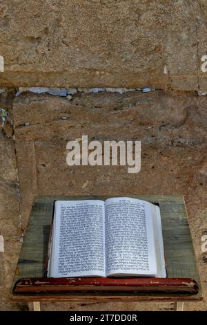A siddur or Jewish prayer book is open to the Hebrew text of the Song ...