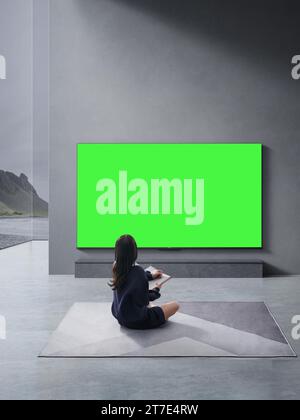 People are watching and enjoying next to the TV, monitor with green ...