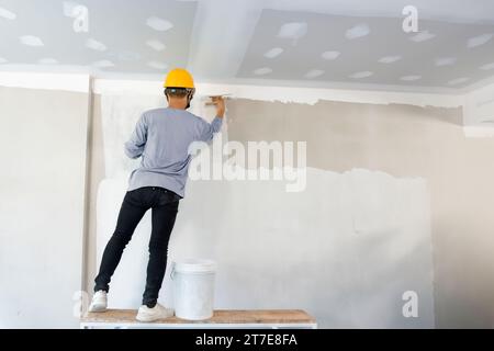 Empty room interior with gypsum board ceiling at house construction ...