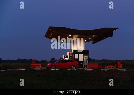 Modern self service gas station at night Stock Photo - Alamy